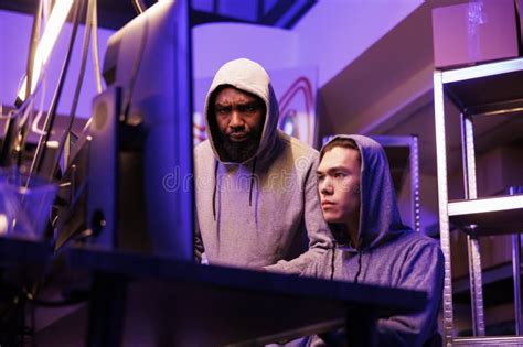Hackers Identifying System Vulnerability Stock Image Image Of