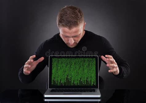 Man Or Hacker Stealing Data From A Laptop At Night Stock Image Image Of Demonstrating