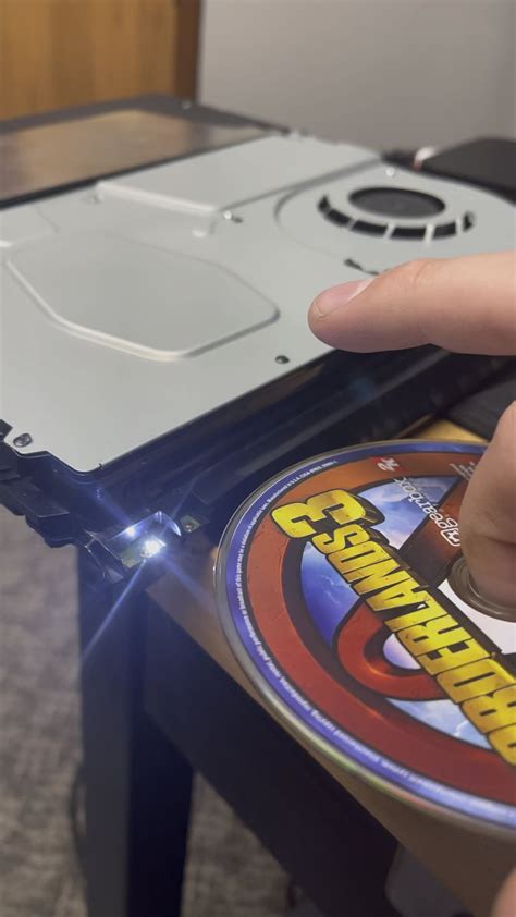 ps4 slim not accepting disks and making a weird buzz sound r
