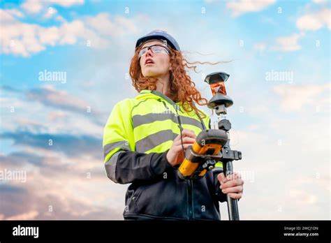 Female Woman Land Surveyor Working With Moder Surveying Geodesic
