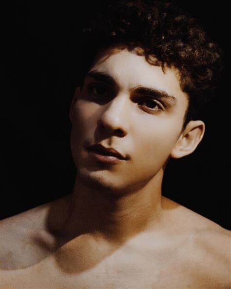 Premium Photo Portrait Of Shirtless Young Man Over Black Background
