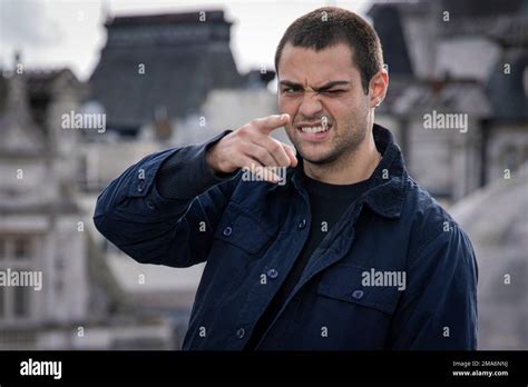 Noah Centineo Poses For Photographers During A Photo Call To Promote