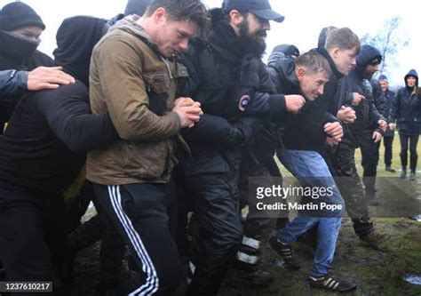 Interlocking Arms Photos And Premium High Res Pictures Getty Images