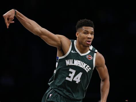 Giannis Antetokounmpo Black Background 2k Wallpaper Download