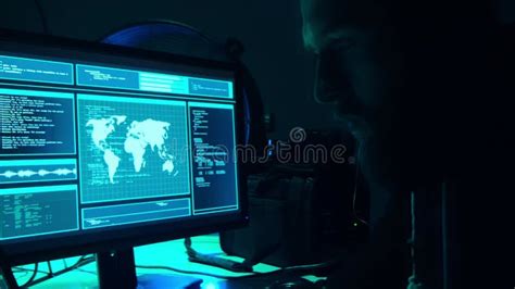 wanted hackers coding virus ransomware using laptops and computers in