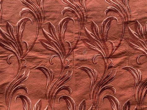 Rust Thread Floral Embroidery On Linear Style On Rust Silk Fabric Stock