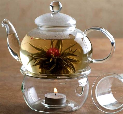 Заварочный стеклянный чайник заварник из стекла с фильтром пружинкой и подогревом с колбой из
