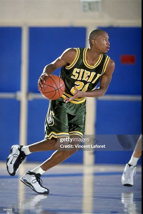 Dwayne Archbold Of The Siena Saints Dribbles During The Sparkletts