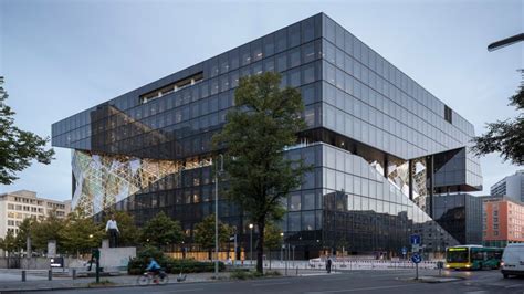 Faceted Glass Atrium Bisects Oma S Axel Springer Building In Berlin