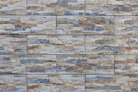 Rectangular Tile Featuring Stone Texture With Various Shades Of Grey