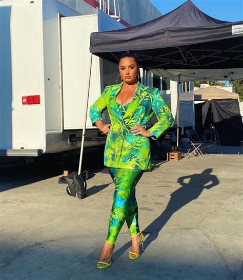 Demi Lovatos Bold Deep Cleavage Outfits 4 Photos The Fappening