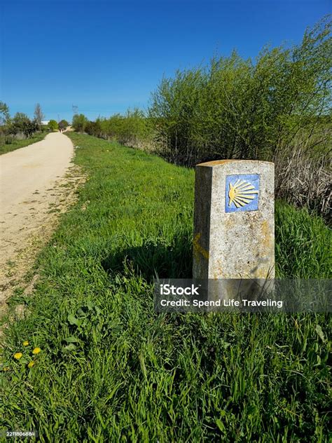 Official Camino De Santiago Trail Marker With Yellow Shell Symbol In
