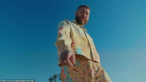 Doja Cat Runs Topless Through A Meadow In New Post Malone Music Video