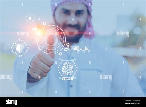 arab male happy with finger scan technology for personal data security protection system stock