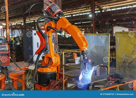 Robotic Welding Machine Welding A Steel Plate Of Steel Structure With Robotic Welding Or