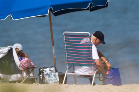 Jill Biden Watches On While Woman Blows A Kiss To Joe On The Beach As President Chillaxes During