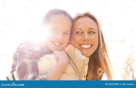 Fun In The Sun With Mom A Happy Mother And Daughter Spending Time Together Outdoors Stock