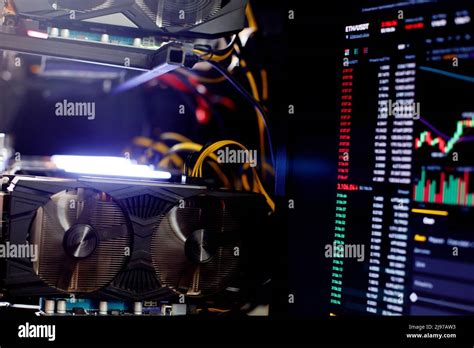 Graphics Cards In Rig For Ethereum Mining Farm On Background Stock Market ETH Chart Stock Photo