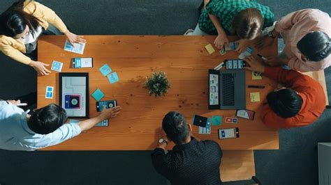 Premium Photo Programmer Sharing Ux Ui Design Idea With Developer At Meeting Convocation