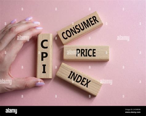 Cpi Consumer Price Index Symbol Concept Word Cpi On Wooden Blocks Businessman Hand