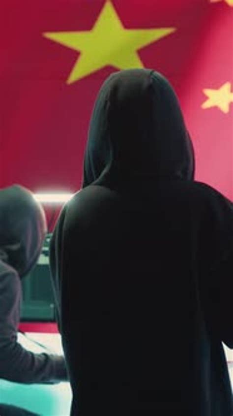 Vertical Video Chinese Hacker Working In Governmental Hacking Room With Chinese Flag Technology