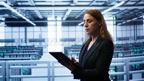 Woman Working In Data Center Housing Advanced Data Storage