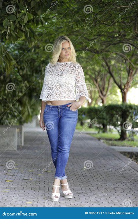Woman Posing In High Heels And Denim Jeans Stock Image Image Of Jeans
