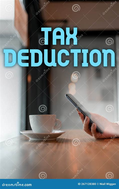 Sign Displaying Tax Deduction Word Written On Amount Subtracted From