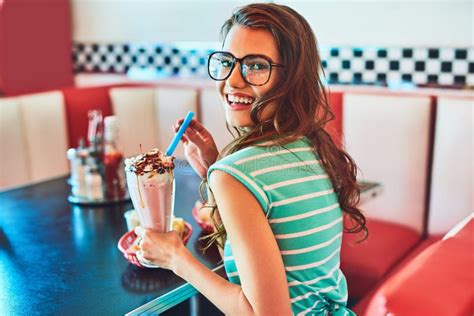 Restaurant Happy And Portrait Of Woman With Milkshake Strawberry