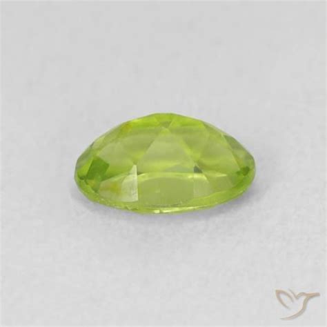 Shop 0 91ct Oval Cut Peridot Gemstone 7 X 4 9 Mm Gemselect