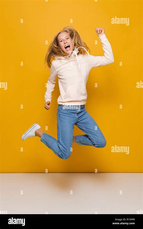 Full Length Photo Of Happy Woman 16 18 With Dental Braces Jumping And Laughing Isolated Over