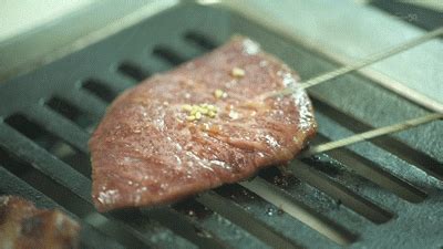 Flipping A Slice Of Quality Meat 