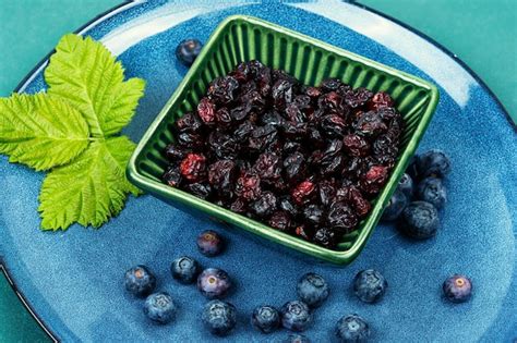 Premium Photo Fresh And Dried Berries Snack