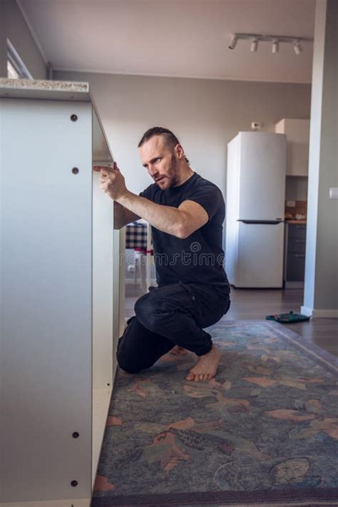 Man Assembling Furniture Stock Image Image Of Indoors 177647261