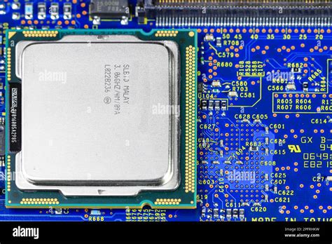 Close Up Of High Performance CPU Or Central Processor Unit On Electronic Board Background Stock