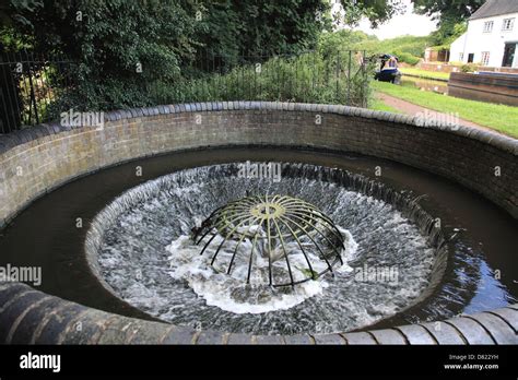 Circular Weir Spill On The Staffordshire And Worcestershire Canal At