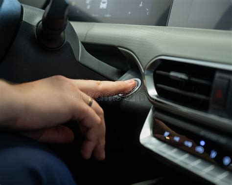 A Man Presses The Car Engine Start Button Stock Image Image Of Power Panel