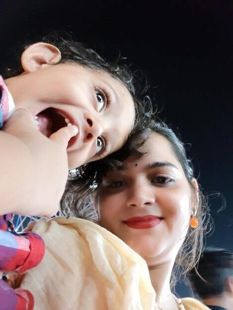 Premium Photo Portrait Of Smiling Mother With Son