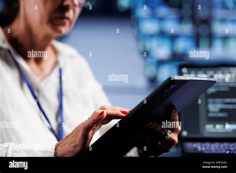 Close Up Shot Of Senescent Admin Writing Script Code In Data Center On Laptop Terminal