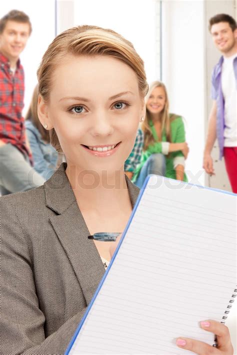 Teacher With Big Notepad At Babe Stock Image Colourbox