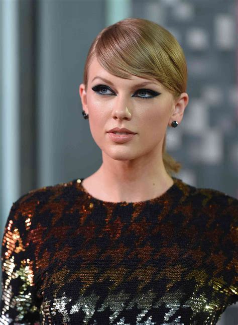 Taylor Swifts Signature Bangs Signify Their Own Eras