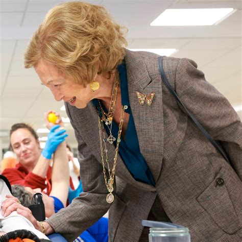 Queen Sofia With A Camera Style Crossbody Bag By Armani