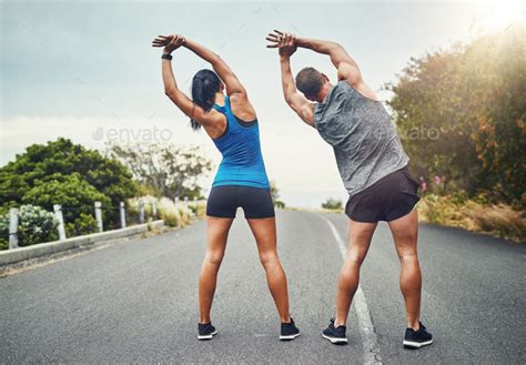 Stretching In Perfect Sequence Stock Photo By YuriArcursPeopleimages
