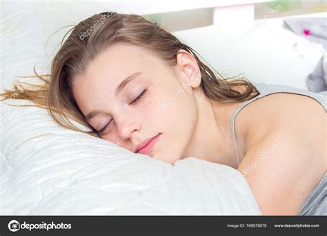 Girl Sleeping On A Bed At Linda Durham Blog
