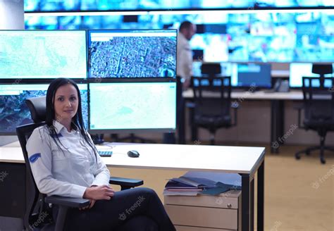 Premium Photo Portrait Of Female Security Operator While Working In A Data System Control Room