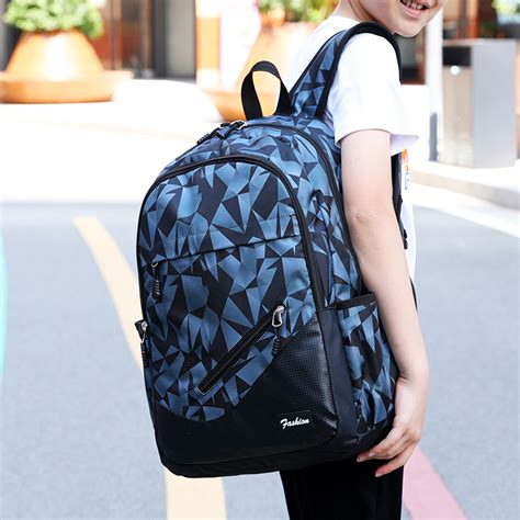 三年级书包男小学生轻便1一3年级男童书包儿童一年级书包1 6年级虎窝淘