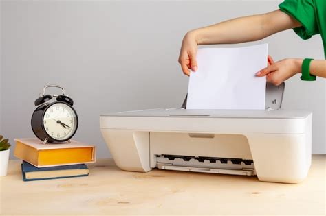 Premium Photo Close Up Of Woman Using A Printer Machine