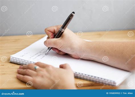Girl Handwiritng Into Note Pad Stock Photo Image Of Corporate Signature 195859952