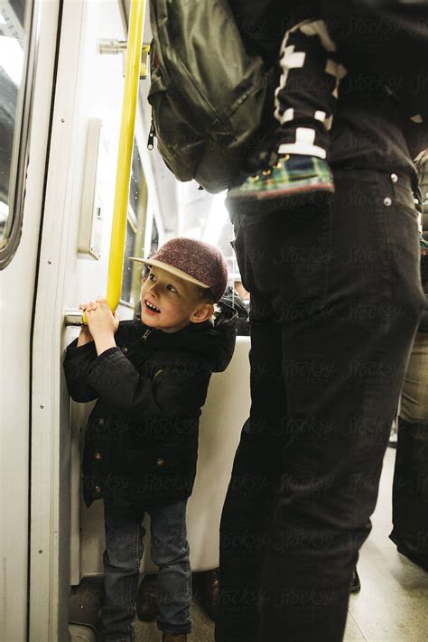 Babe Family Taking Bus Transit In City Together By Stocksy Contributor Rob And Julia