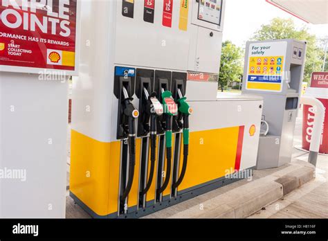 Petrol pump with the various fuel types at the Shell petrol station ...